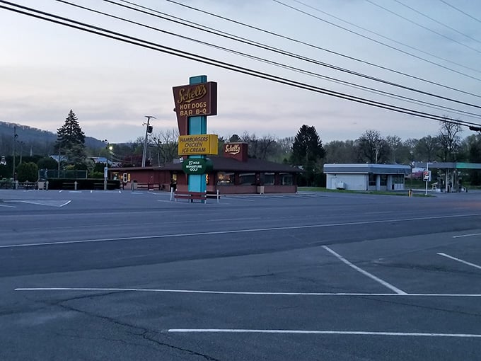 Even at dusk, that iconic sign beckons like a old friend saying "come on over, we've got you."