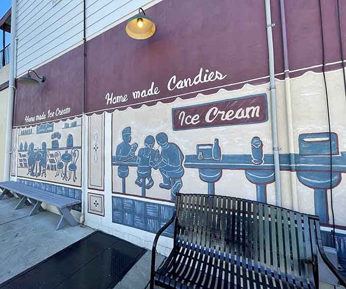 The exterior mural celebrates the timeless art of candy-making, turning the building itself into a love letter to sweets.