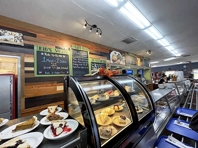 The dessert case gleams with possibilities, each slice calling your name in sugary harmony.