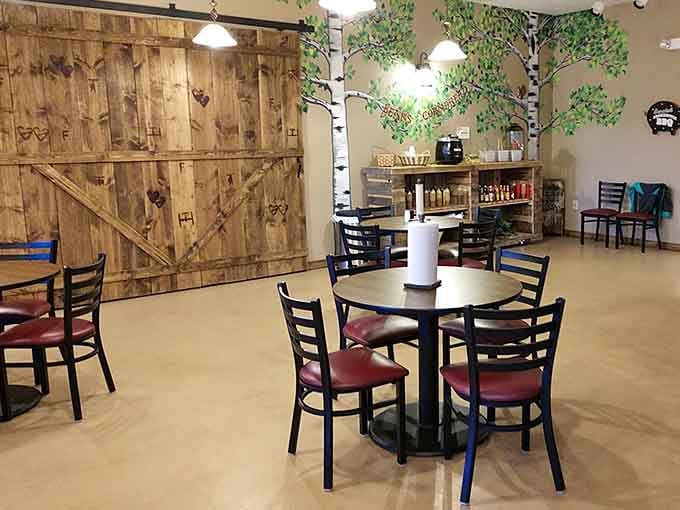 Decorative barn doors adorned with rustic charm remind you that authentic barbecue and genuine hospitality never go out of style here.