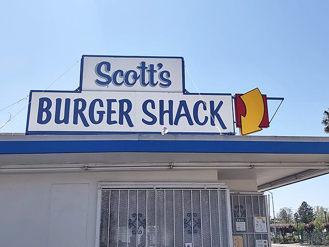 That iconic sign standing tall like a beacon guiding hungry travelers to their delicious destiny.