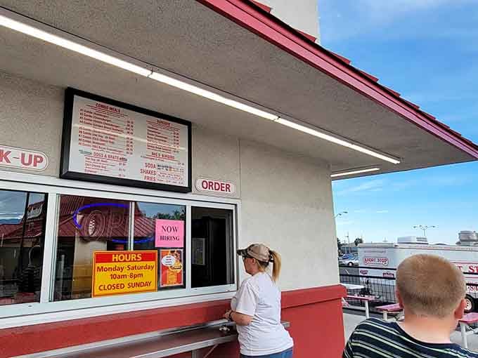 Real people ordering real food at a real restaurant, proving authenticity still matters in our complicated world.
