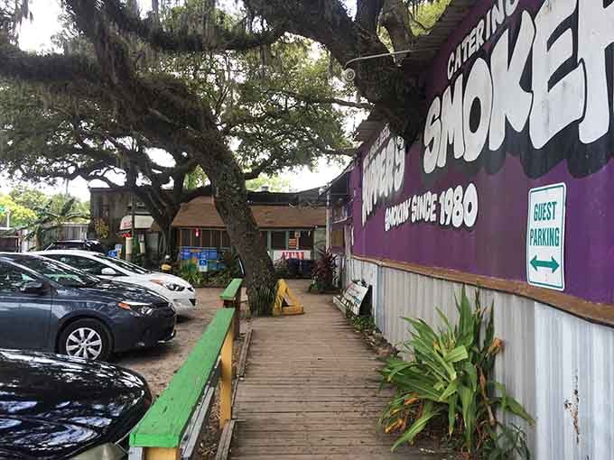 That walkway leads to flavor paradise, where tie-dye murals promise an experience your taste buds won't forget.