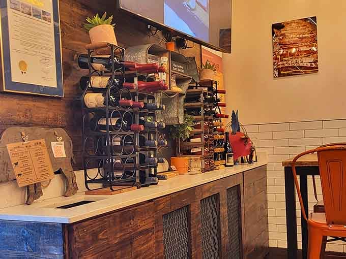 A wine rack at a barbecue joint proves that sophistication and smoked meat aren't mutually exclusive concepts.