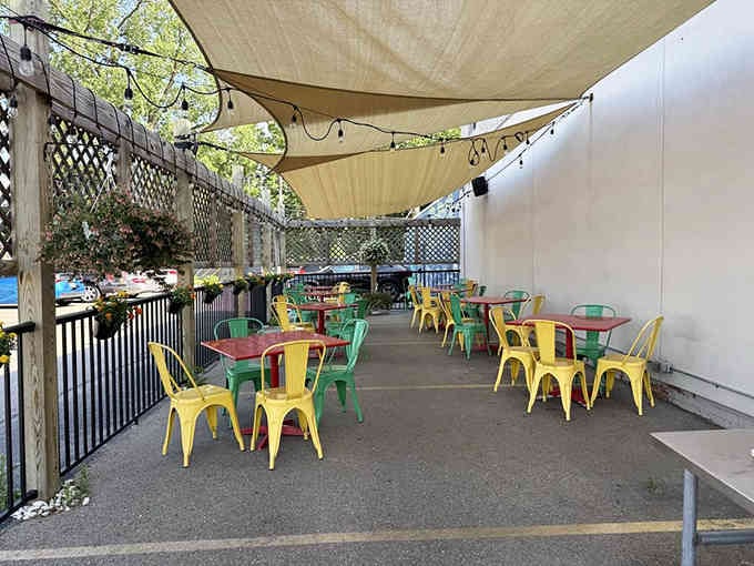 Colorful outdoor seating under shade sails means you can enjoy your meal al fresco when Michigan weather cooperates.
