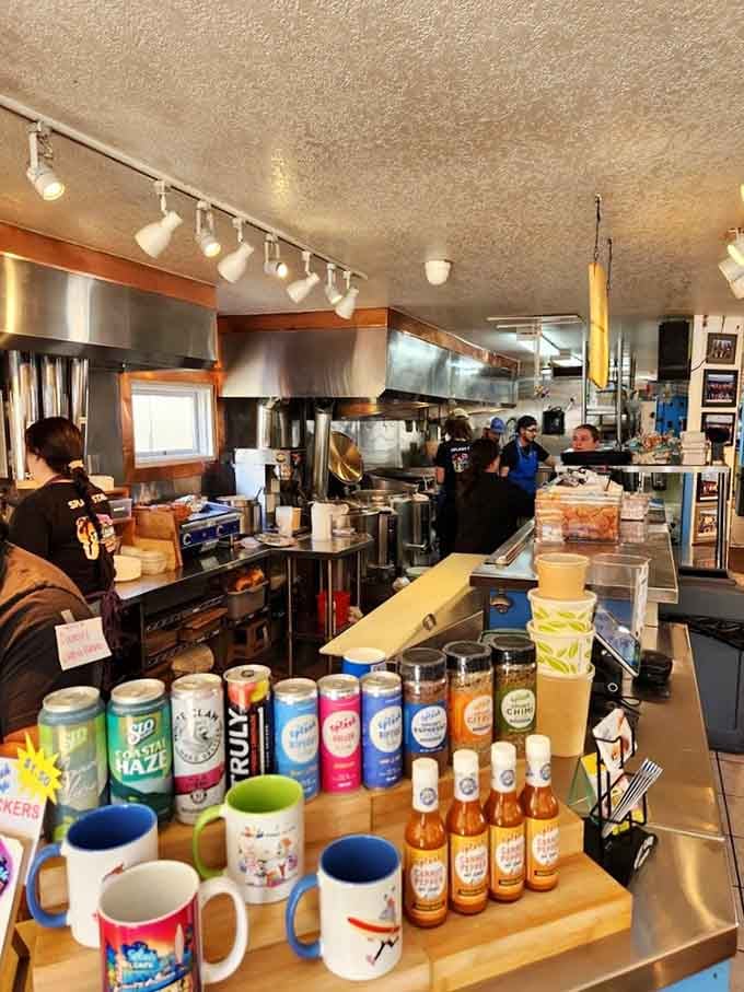 Colorful mugs and hot sauce bottles line the counter, adding personality to a space that's all about unpretentious deliciousness.