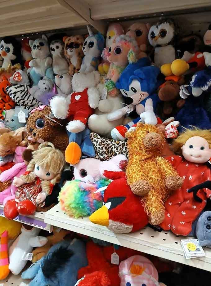 Plush toys stacked like a carnival prize wall, ready to become someone's new best friend or nostalgic keepsake.