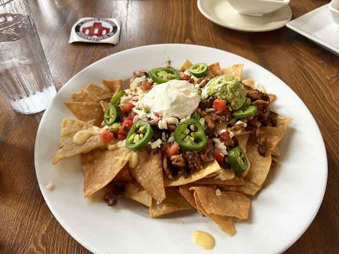 Loaded nachos piled high with toppings, the kind of shareable appetizer that disappears faster than you'd expect.