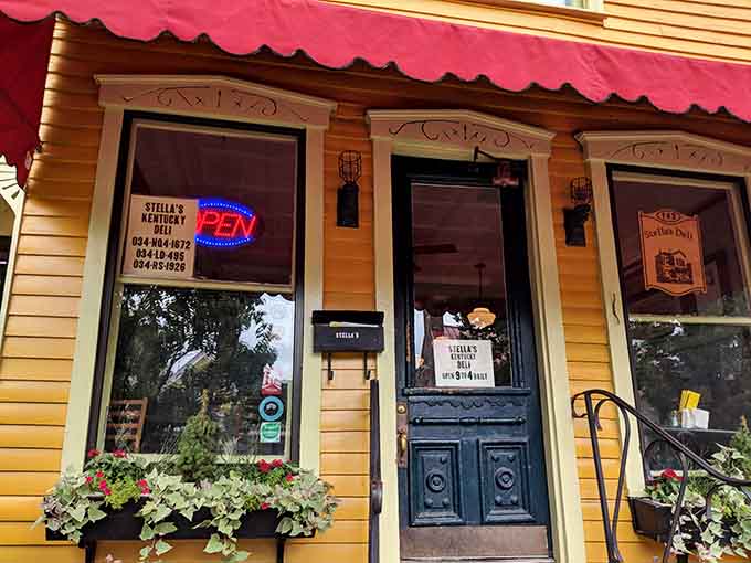 The entrance welcomes you with an ornate door and window boxes, setting expectations high before you even step inside.