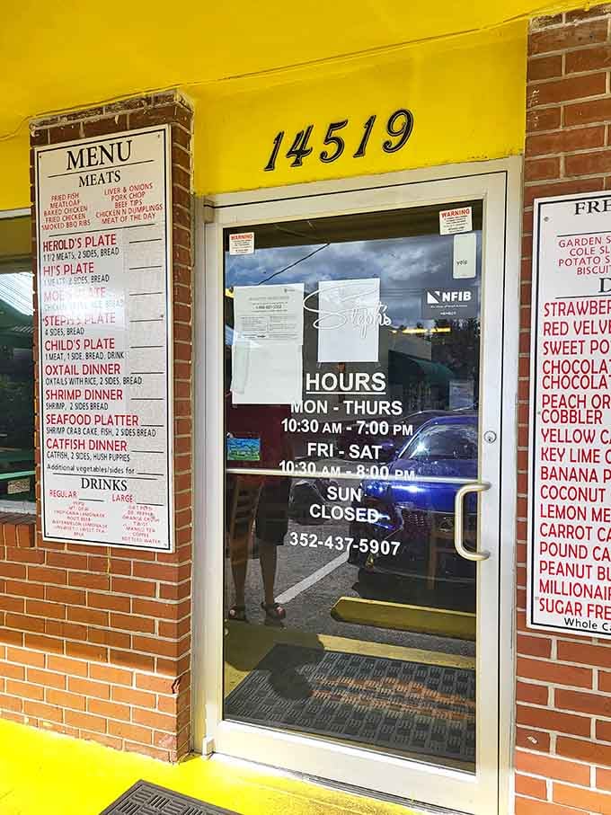 The entrance displays hours and promises, Monday through Saturday they're serving up happiness, one plate at a time.