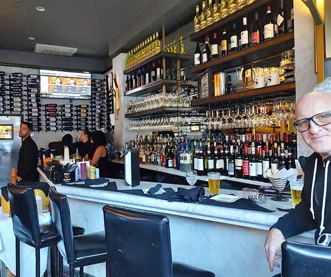 The well-stocked bar gleams with possibilities, from classic cocktails to Italian wines that transport you across the Atlantic.