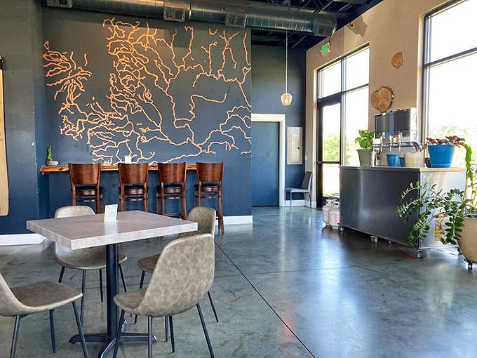 The artistic wall installation and modern seating create an atmosphere that's equal parts sophisticated and welcoming to everyone who enters.