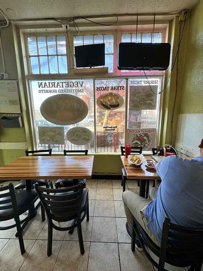Window posters advertising the goods while diners inside discover why this place has such a devoted following among locals.