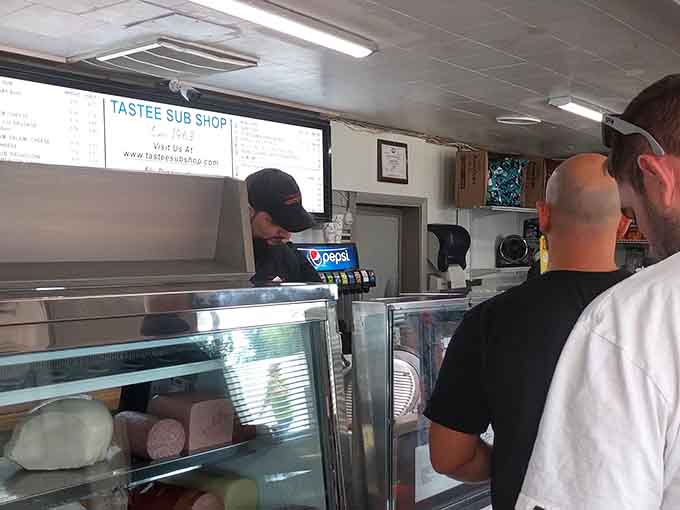 Behind that counter, skilled hands work efficiently, turning simple ingredients into lunchtime magic every single day.