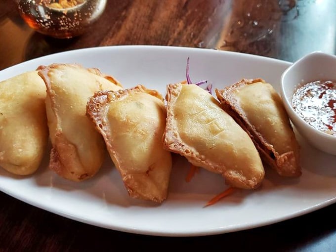Crab rangoon so golden and crispy, they're basically edible treasure chests filled with creamy deliciousness inside.