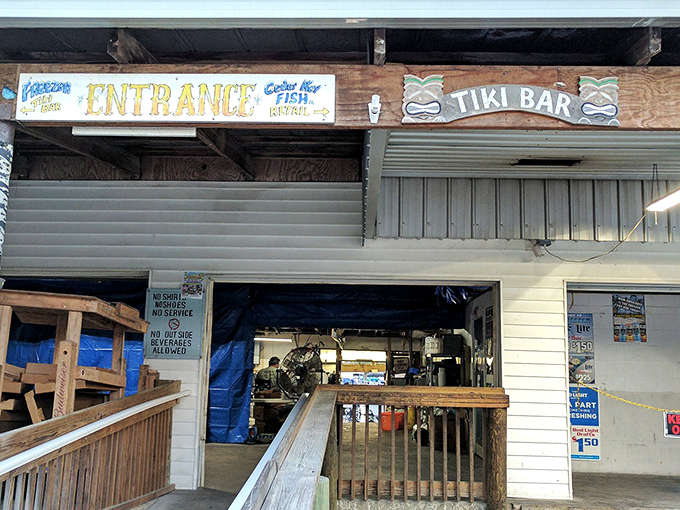 The tiki bar entrance welcomes you to paradise, Florida-style, where flip-flops are formal wear.
