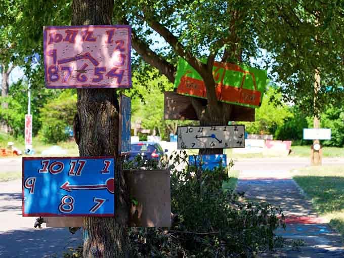 Time becomes beautifully meaningless when clocks sprout from tree trunks like colorful mechanical mushrooms in summer.