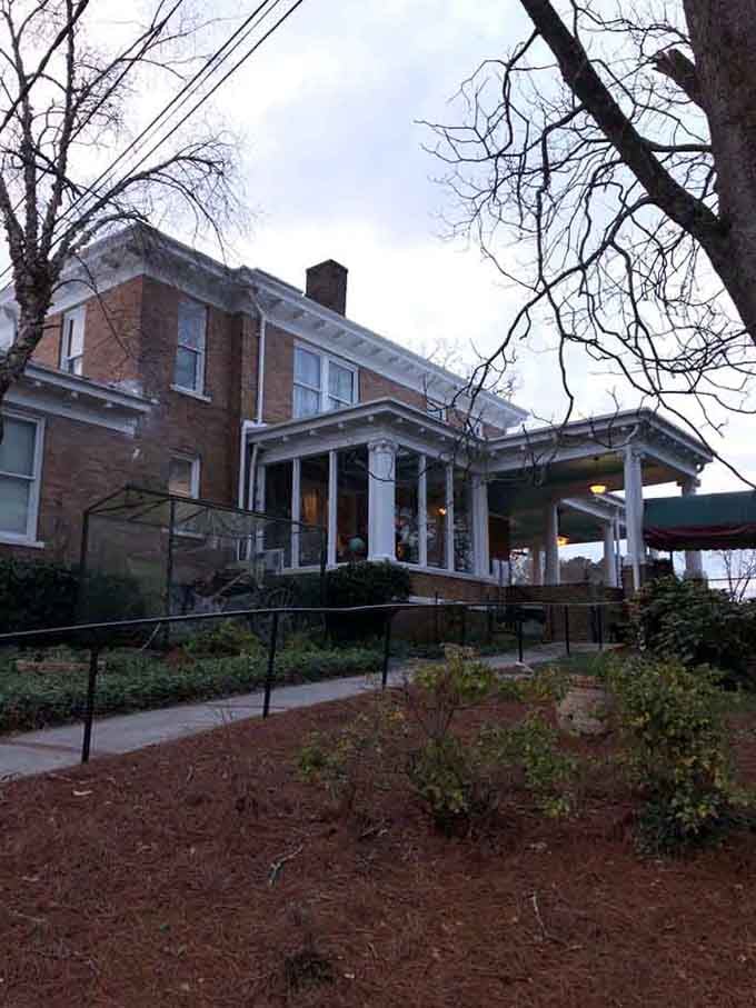 Winter twilight casts a soft glow on the manor, making even the exterior look warm and inviting.