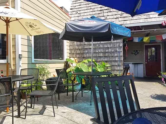 The outdoor patio offers fresh air dining under colorful umbrellas, because sometimes you need sunshine with your shrimp.