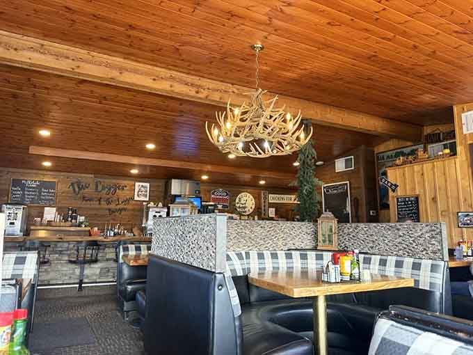 Spacious booths and warm lighting create a welcoming atmosphere where families can actually relax and enjoy their meal.