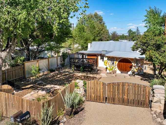 The aerial view reveals how this hobbit hole nestles into its Prescott neighborhood surroundings.
