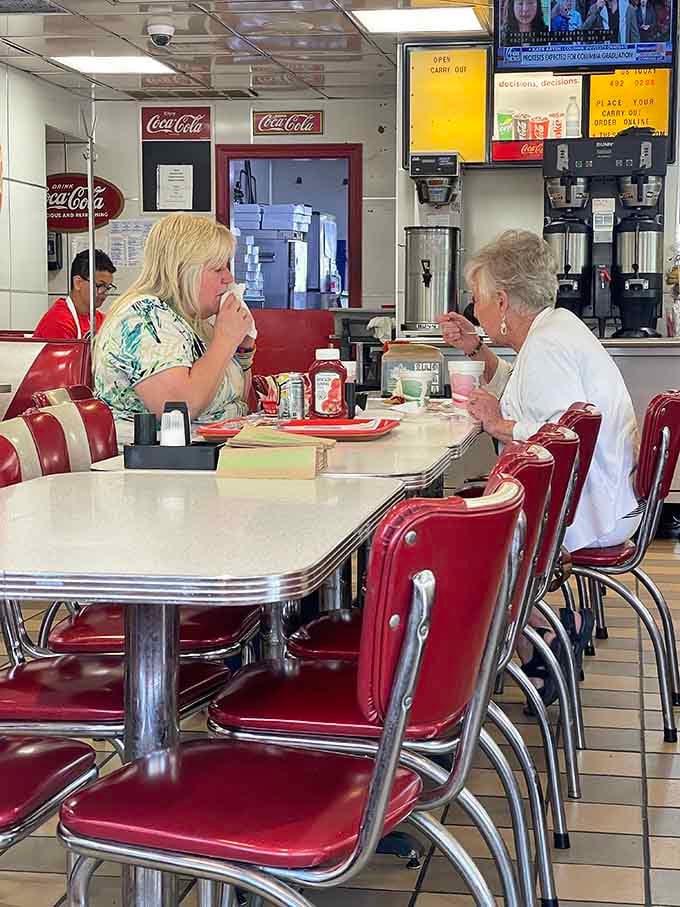 Locals catching up over coffee and conversation&mdash;the real secret ingredient that makes diners truly special places.