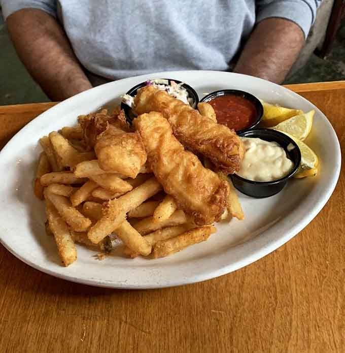 Golden fried fish with fries proves this chili parlor can handle seafood just as well as beef.