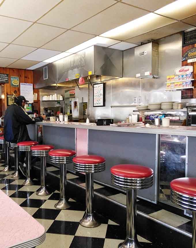 The counter where countless cups of coffee have fueled conversations, debates, and probably some life decisions.