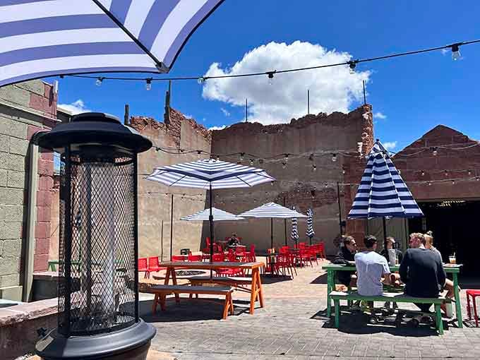 Outdoor patio seating with mountain views and string lights, because Flagstaff weather demands al fresco dining.