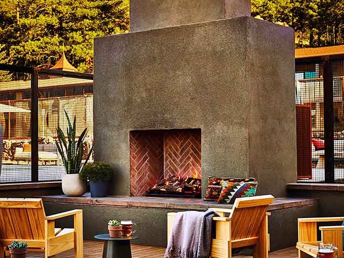 An outdoor fireplace built for gathering proves Arizona evenings were made for storytelling and s'mores under stars.