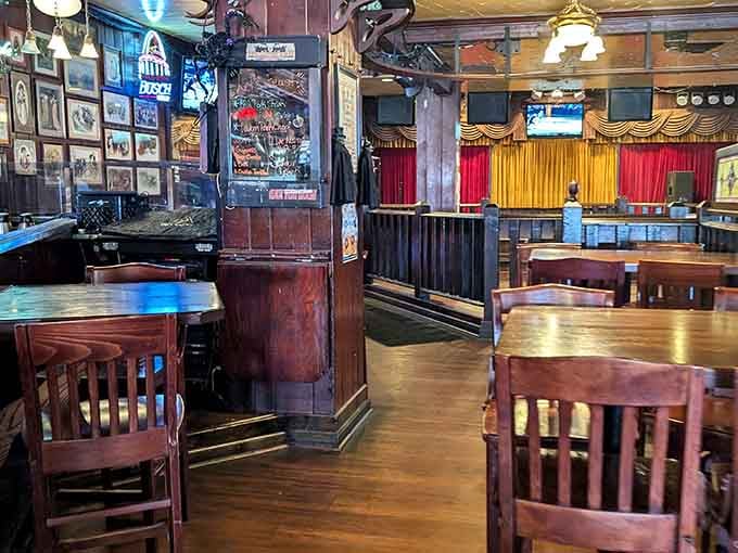 Wooden tables and chairs fill the space, offering plenty of room for groups to gather comfortably.