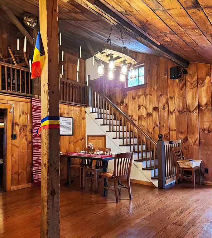 Exposed wooden beams and a staircase hint at multiple levels of discovery waiting inside this charming barn restaurant.