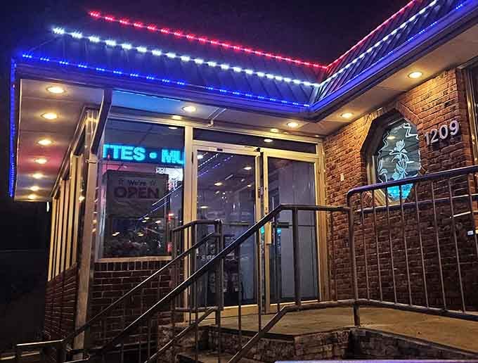Evening lights outline the entrance like a Broadway marquee announcing tonight's star attraction is dinner and it's spectacular.