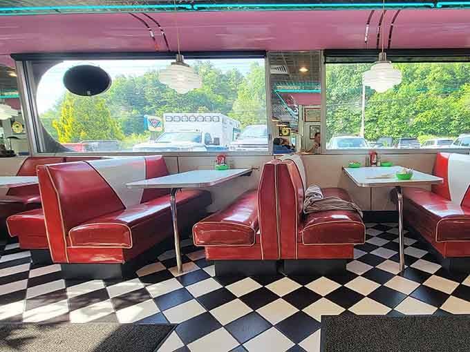 Window-side booths bathe in natural light, creating the perfect spot for lingering over coffee and contemplating a second breakfast.
