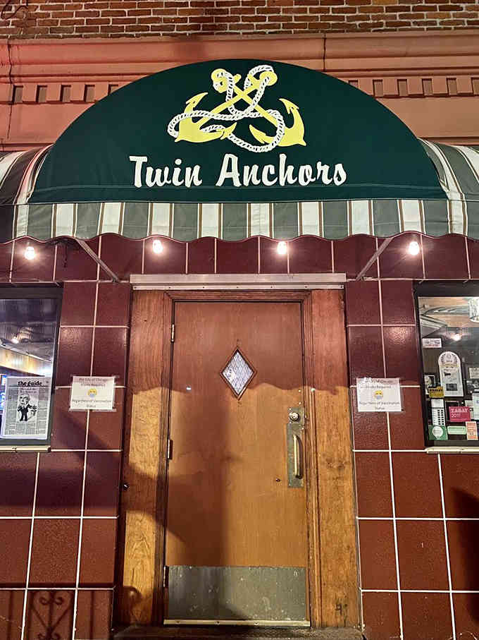 The entrance has welcomed countless diners through decades, its nautical theme never wavering from the original vision.