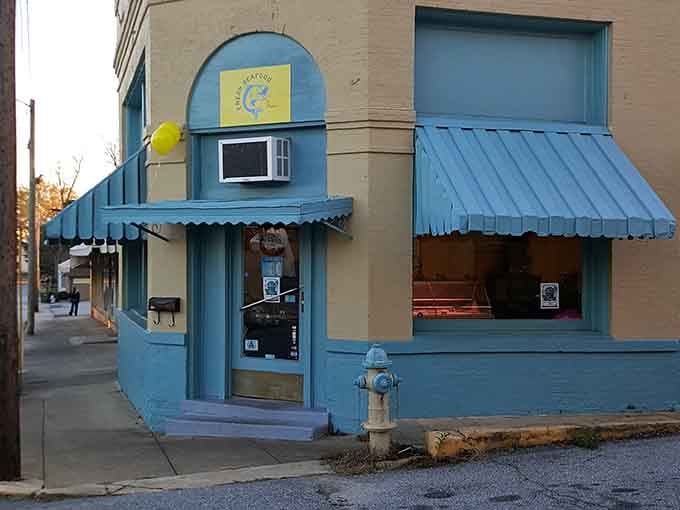 That turquoise storefront adds a splash of personality to Main Street, proving charm doesn't need a corporate branding committee.
