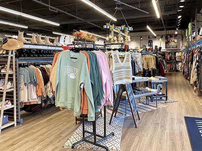 Store interior showcasing the boutique vibe with college sweatshirts front and center for the school spirit crowd.