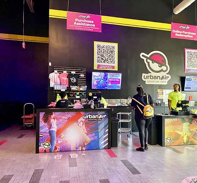 The check-in counter where your adventure begins and your dignity temporarily takes a lunch break.