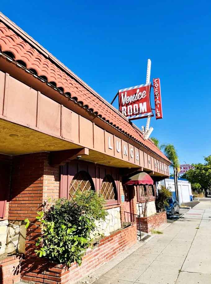 The charming exterior with its terra cotta tiles and vintage signage, a Monterey Park landmark worth finding.