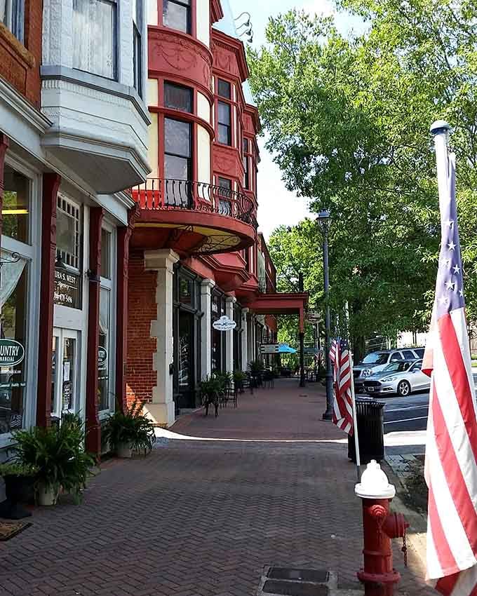 Curved balconies and patriotic bunting add layers of character to streets where every corner deserves its own postcard.
