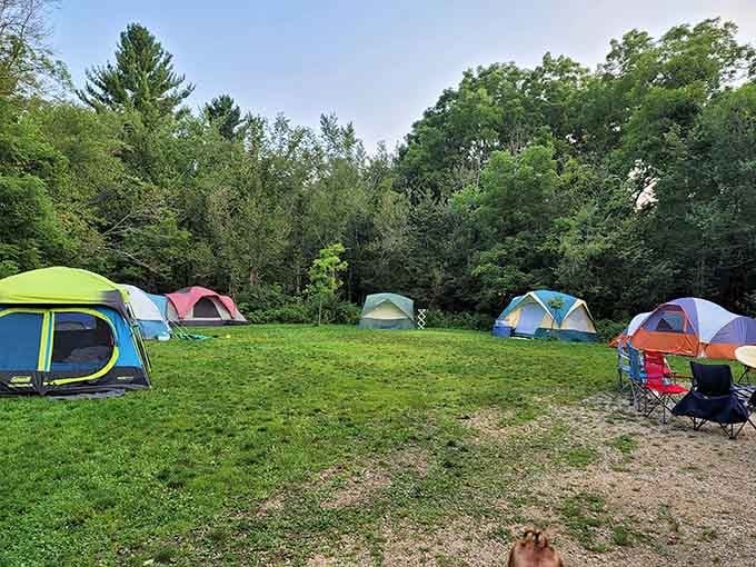 The group camping area offers space for the whole crew to enjoy the valley's protective embrace together.
