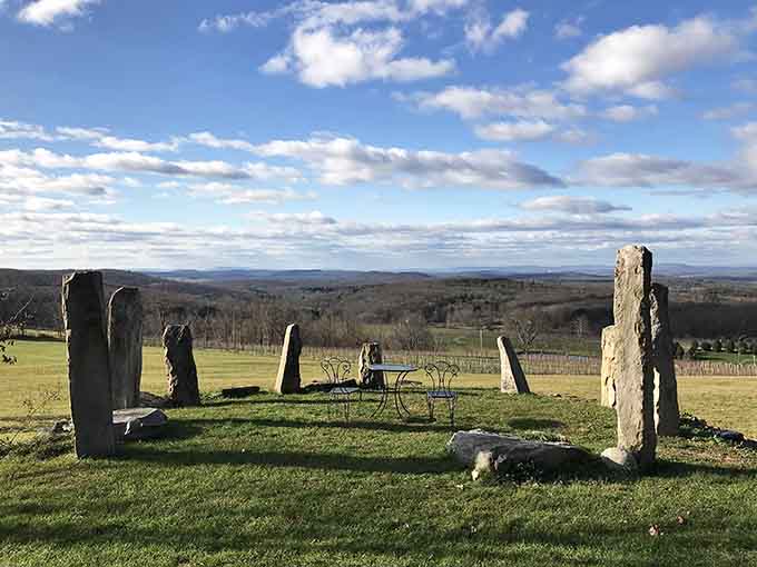 Standing stones framing valley views like some ancient monument decided upstate New York needed more mystical energy.