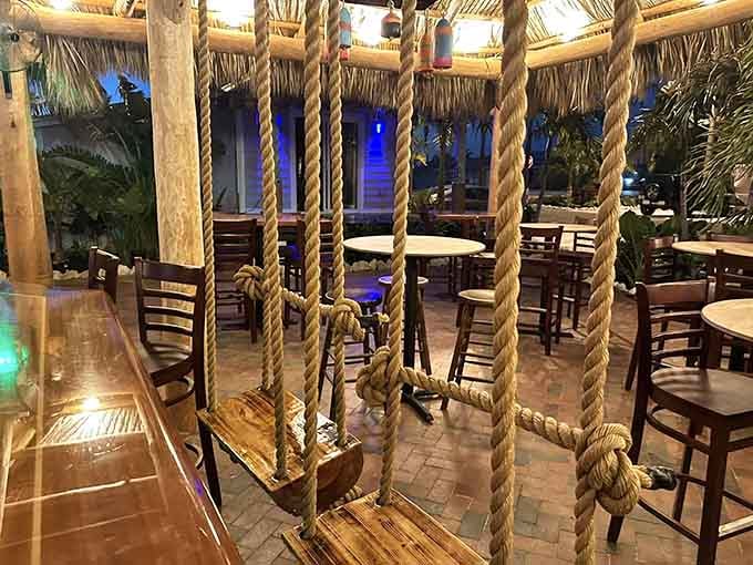 Rope swings at the bar let you channel your inner kid while sipping adult beverages, which is basically the Florida dream realized.