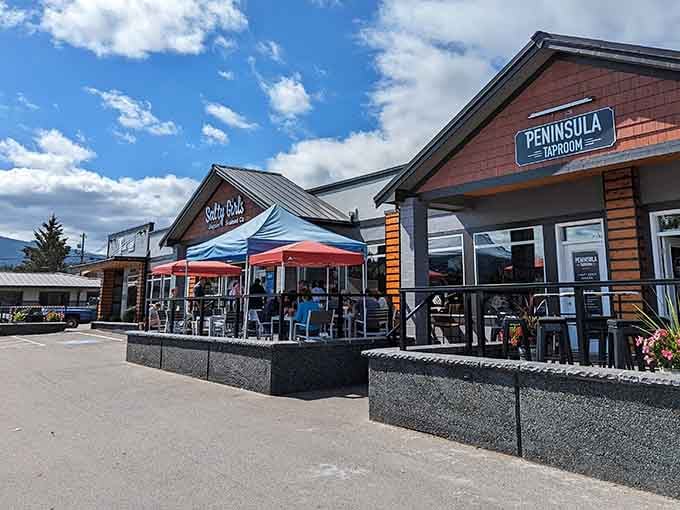 Modern outdoor dining meets mountain town charm where locals gather like characters in your favorite Hallmark movie setting.