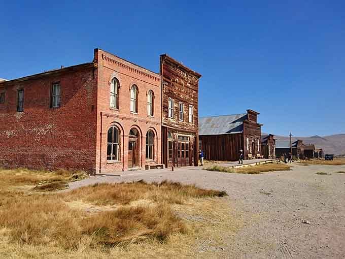 Red brick buildings rise from the desert landscape like monuments to California's gold-fevered past, weathered but still standing proud.