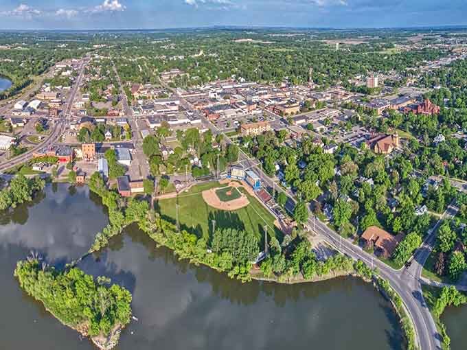 An aerial view reveals Alexandria nestled among lakes like a Scandinavian settlement that actually has documentation.
