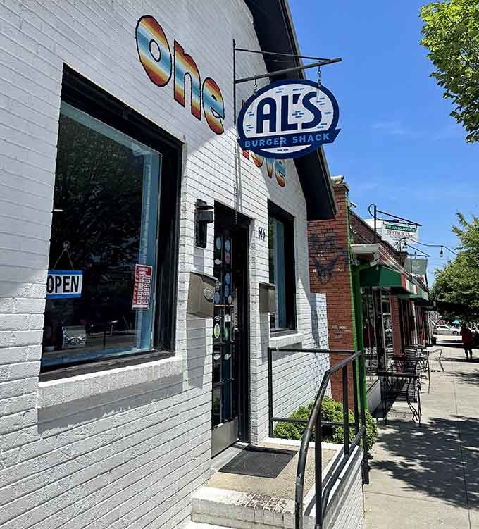 That classic sign hanging outside is like a beacon calling all burger lovers home to their happy place today.