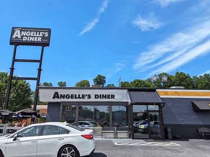 The exterior welcomes you with outdoor seating and plenty of parking, making it easy to stop and fuel up properly before continuing on.