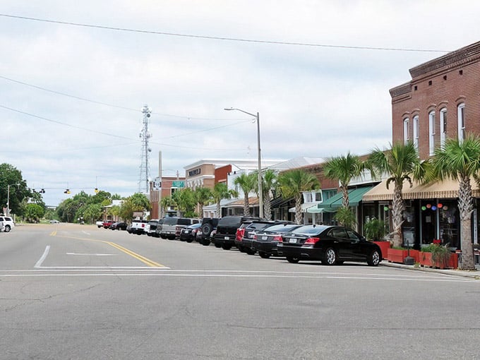Main Street Apalachicola looks exactly like what you pictured when someone said "charming small-town Florida" – mission accomplished, architecture.
