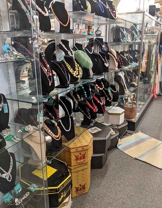 Jewelry displays sparkling with vintage necklaces and bracelets, each piece ready to add history to your outfit.